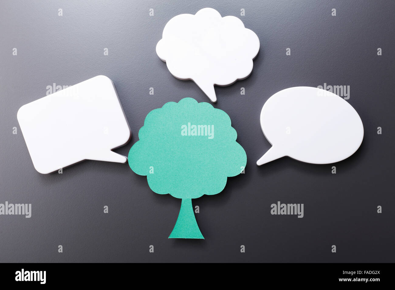 speech bubble and paper tree Stock Photo - Alamy