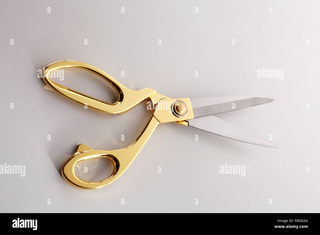 Golden scissors hi-res stock photography and images - Alamy
