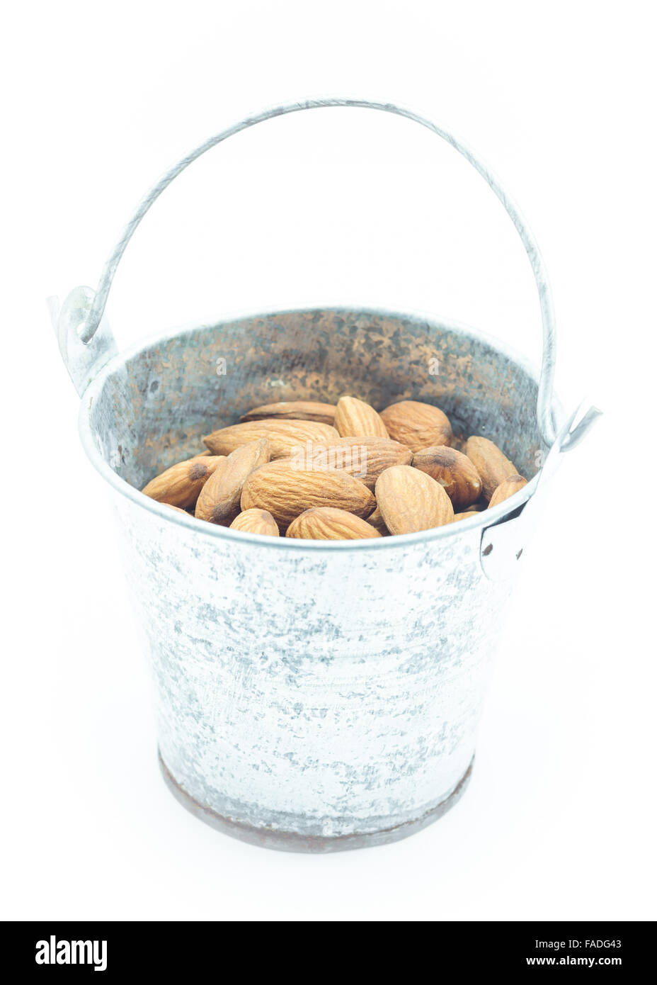 Almonds in bucket isolated on white background, stock photo Stock Photo ...
