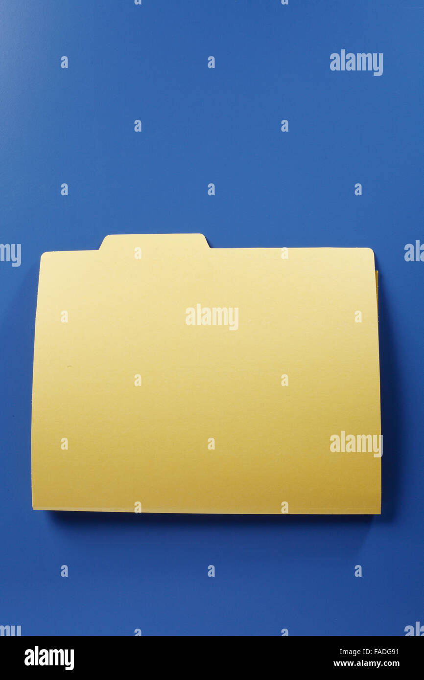Blank File folder on the blue background Stock Photo - Alamy