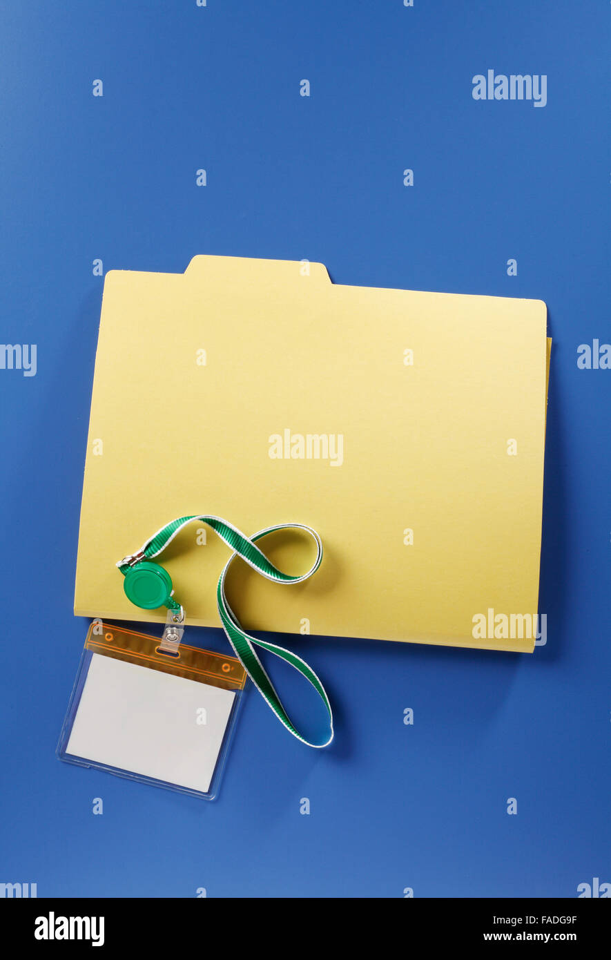 Empty name badge and file document Stock Photo - Alamy