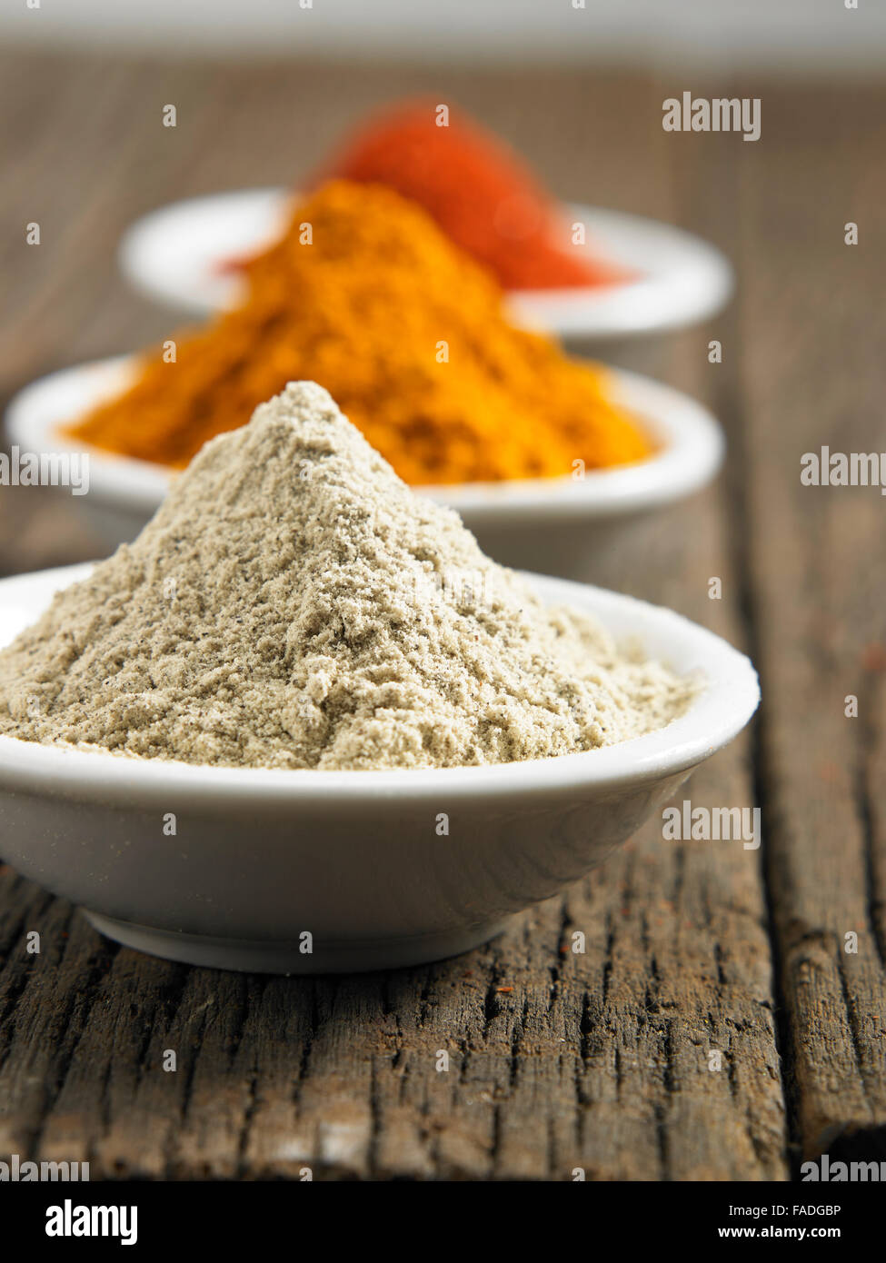 Turmeric ,white pepper and chili powder in spoon Stock Photo - Alamy