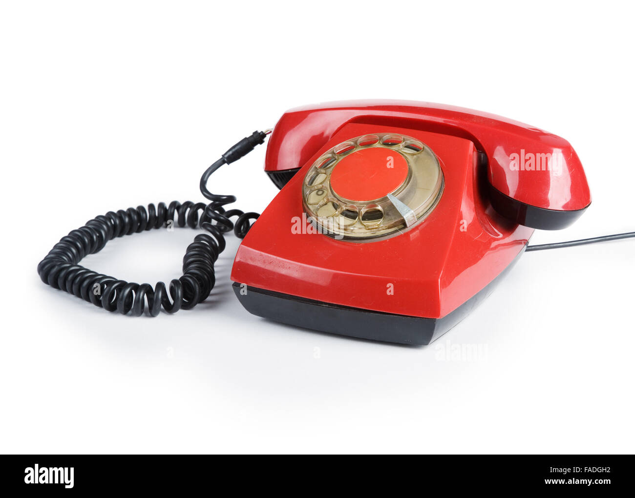 An old red phone on a white background Stock Photo - Alamy