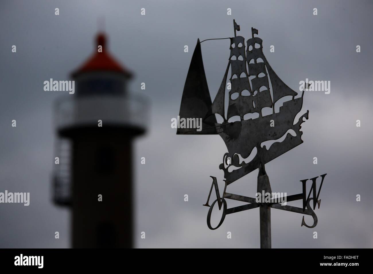Poel, Germany. 26th Dec, 2015. A weather vane shaped like a sailing ...