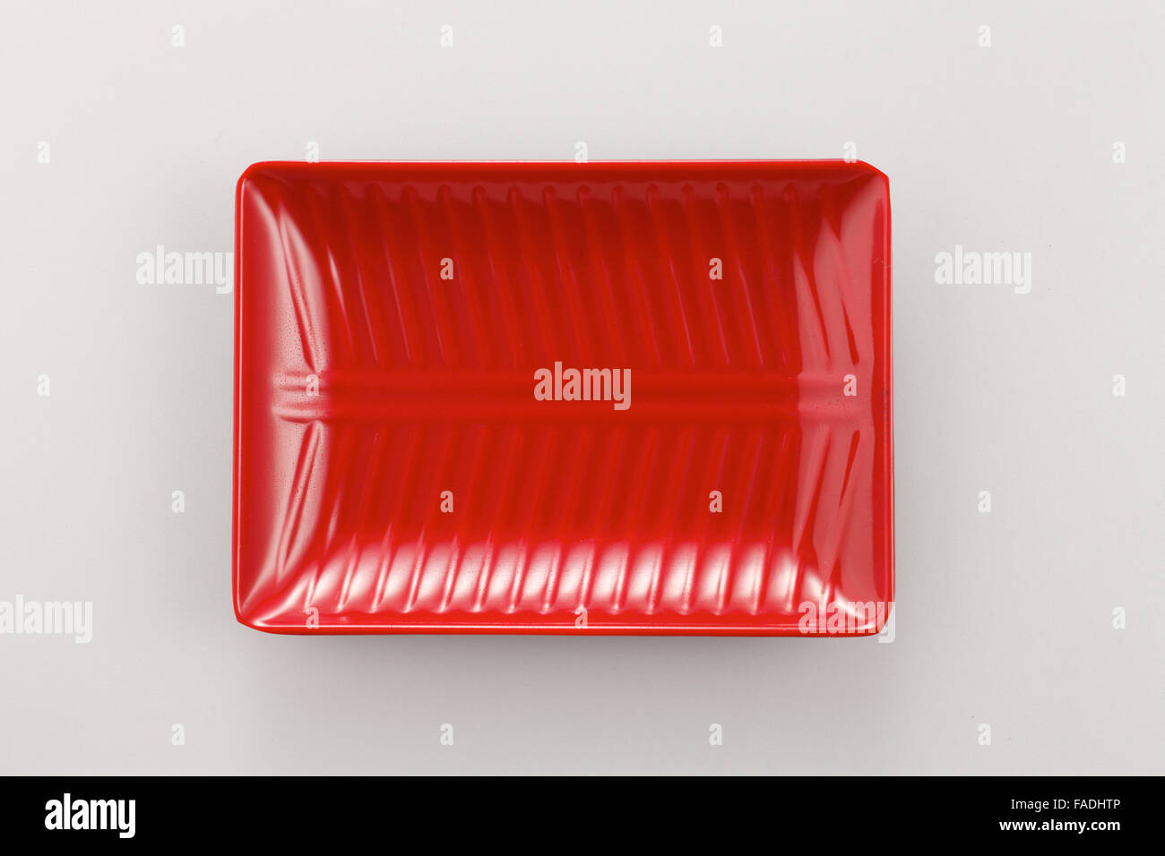 Red rectangular plate with banana leaf texture Stock Photo - Alamy