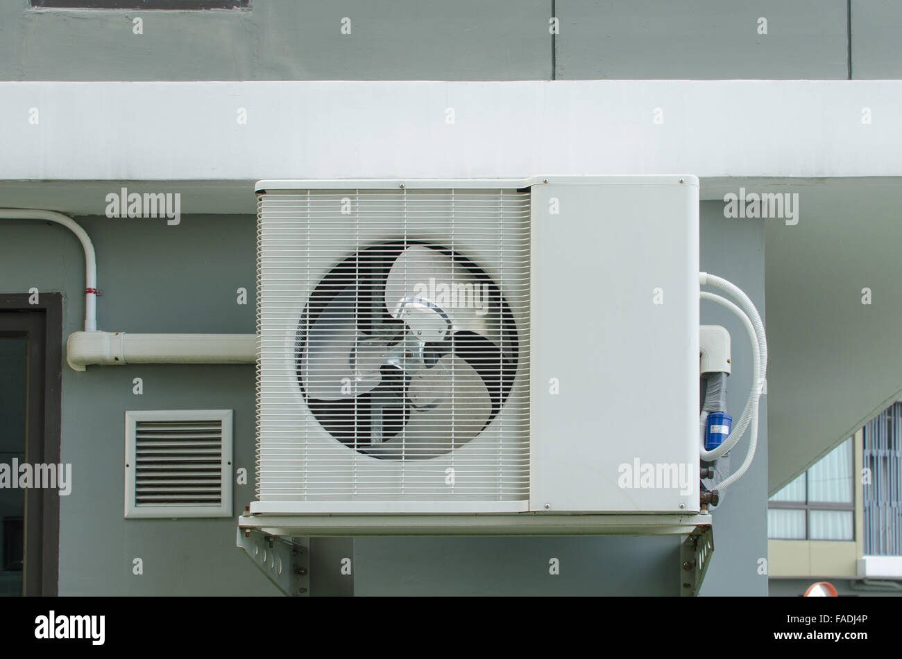 Air compressor installation on wall Stock Photo - Alamy