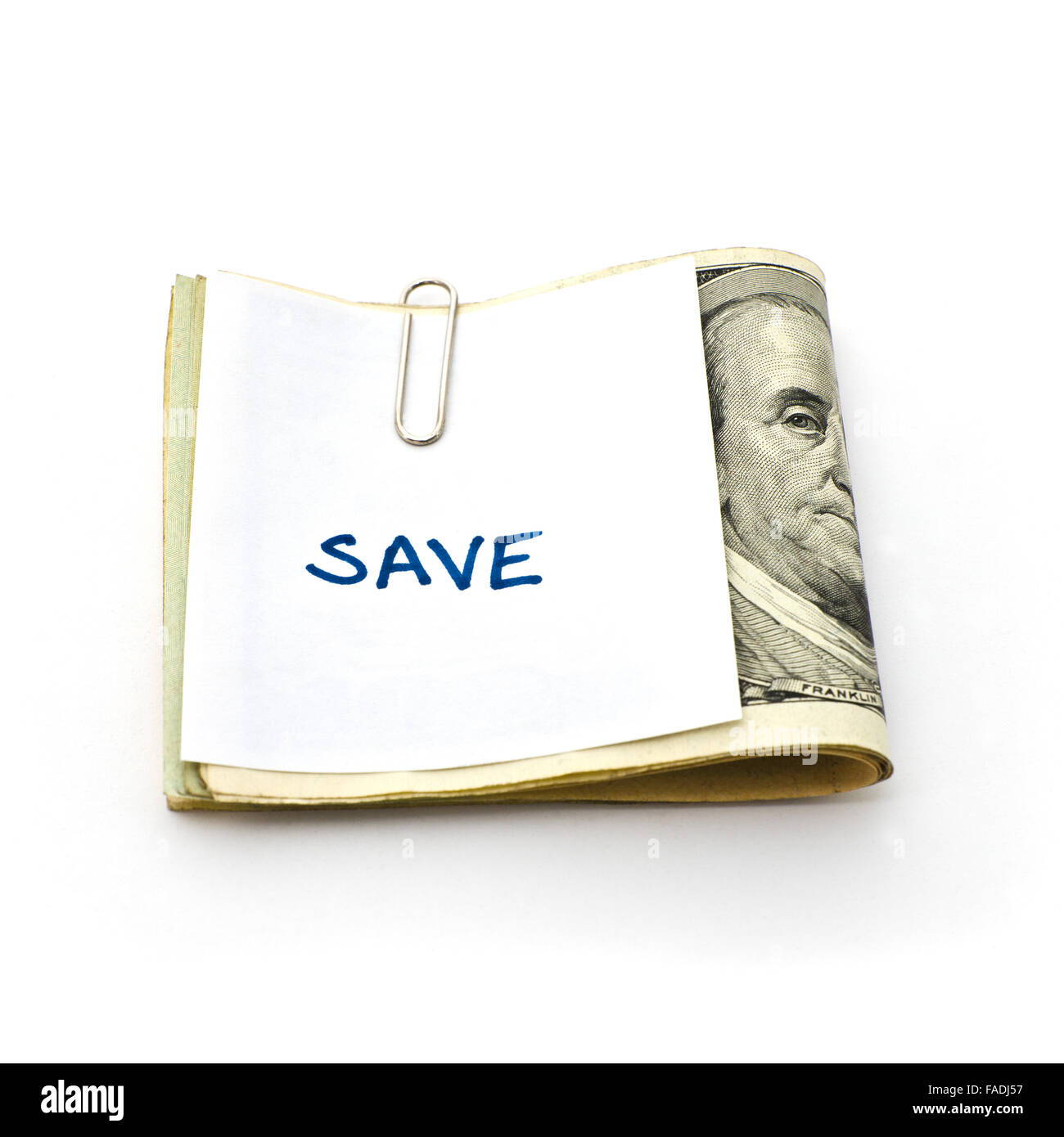 paper clipping on some cash Stock Photo - Alamy