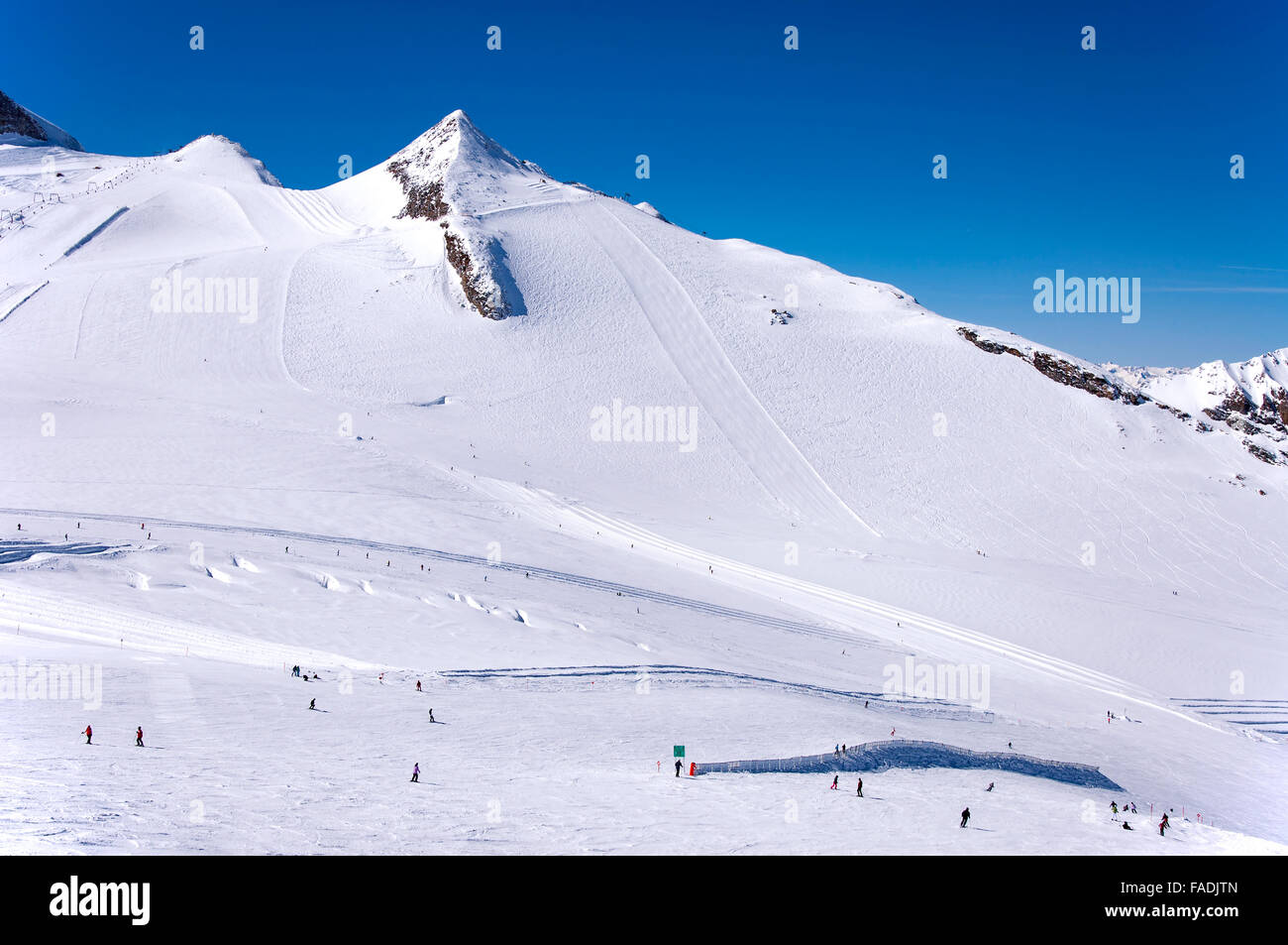 Hintertux Glacier with skiers, snowboarders, ski runs, pistes and ski ...
