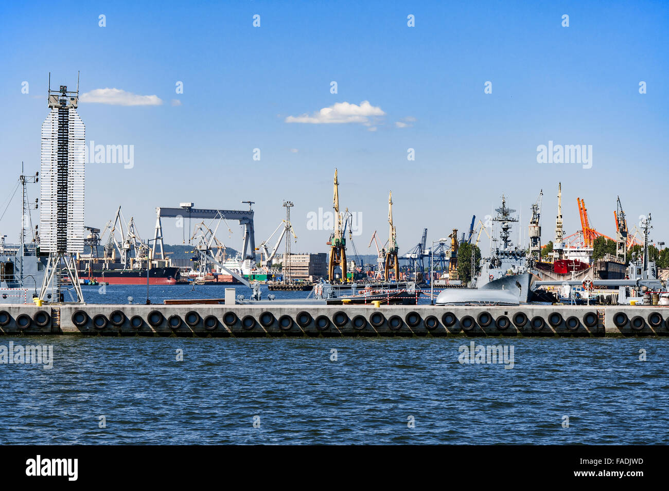 Harbor and shipyard in Gdynia, Poland, with ships, cranes, and a quay ...