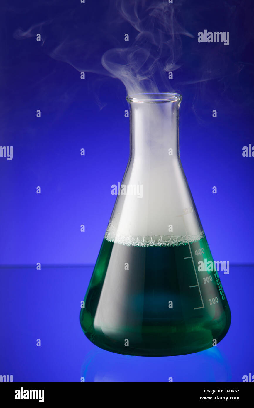 smoke out from the beaker Stock Photo - Alamy