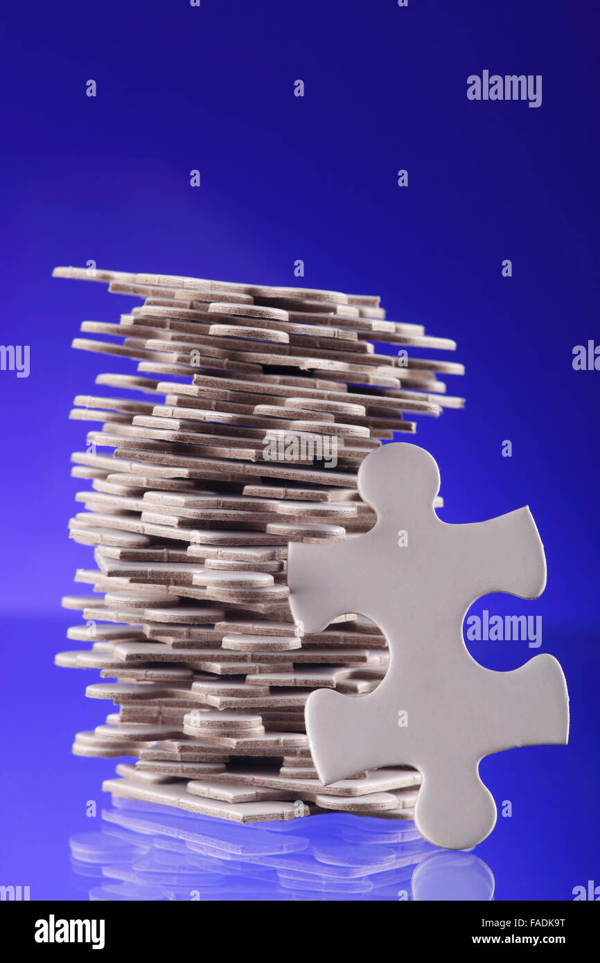 Stack of jigsaw puzzle pieces Stock Photo - Alamy