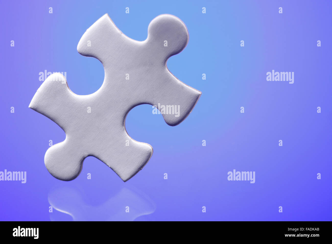 Single piece of a jigsaw puzzle Stock Photo - Alamy