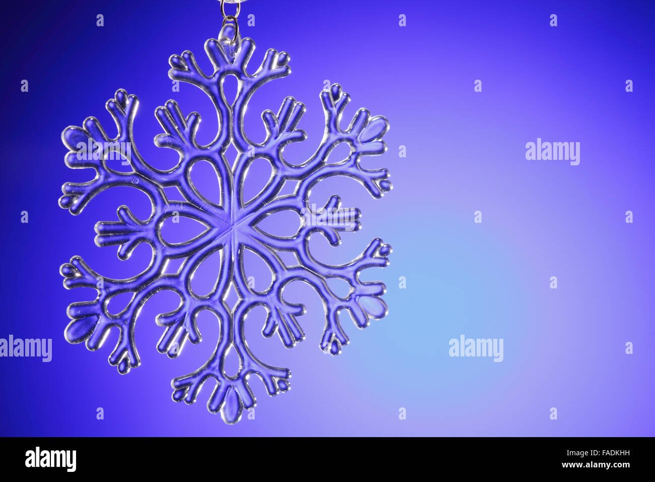 Snowflake blue background hi-res stock photography and images - Alamy
