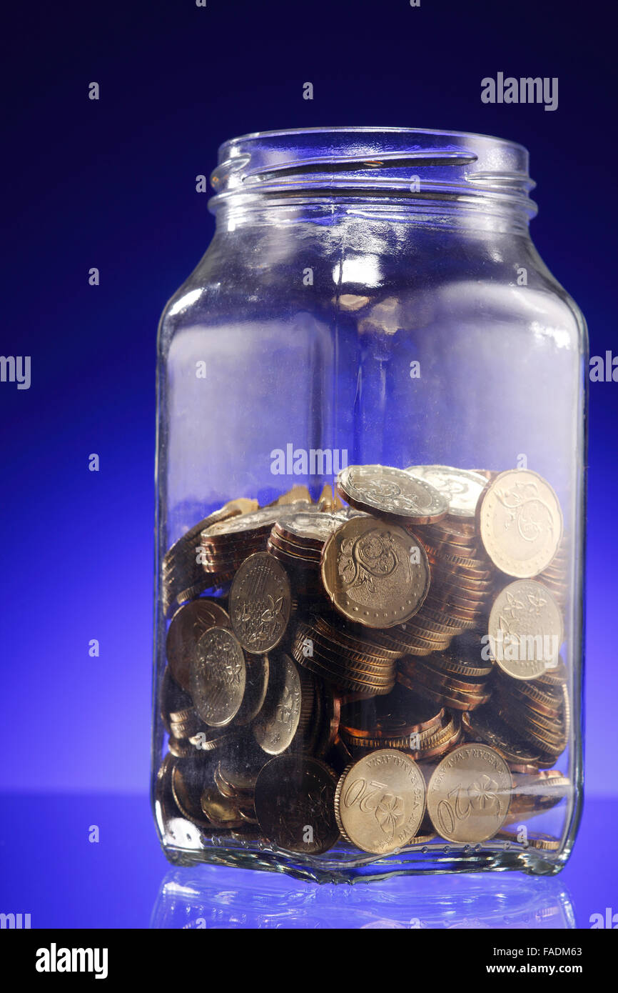 Studio shot jar full coins hi-res stock photography and images - Alamy