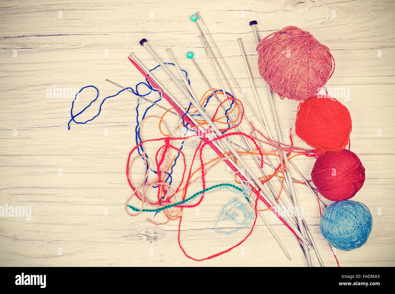 Ball of yarn with knitting needles hi-res stock photography and images ...