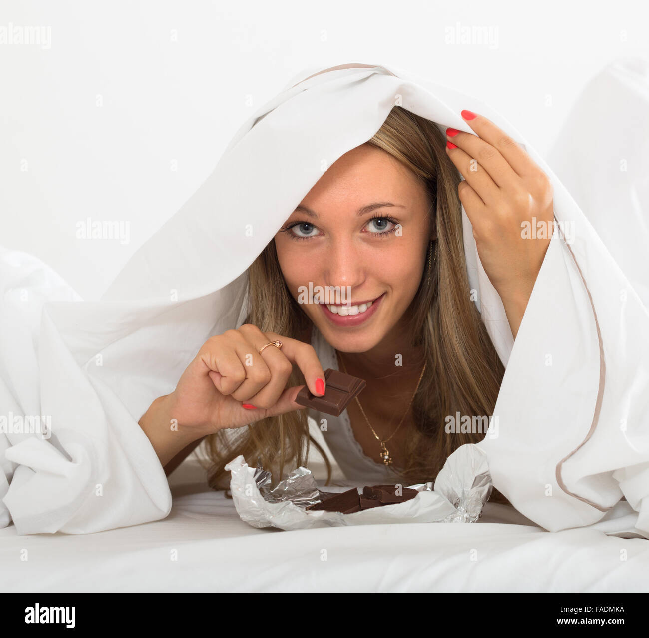 Female chocolate laying bed hi-res stock photography and images - Alamy
