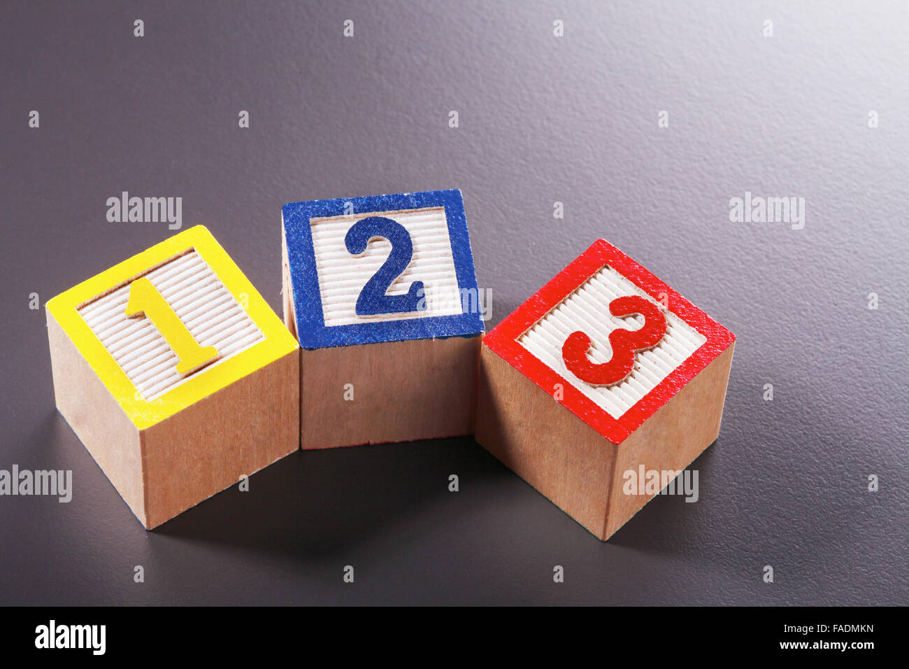 Wooden blocks cube with 123 Stock Photo - Alamy