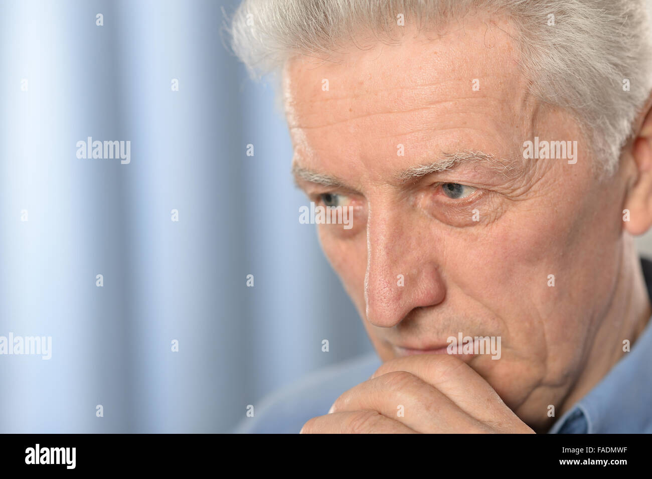 Sad senior man Stock Photo - Alamy