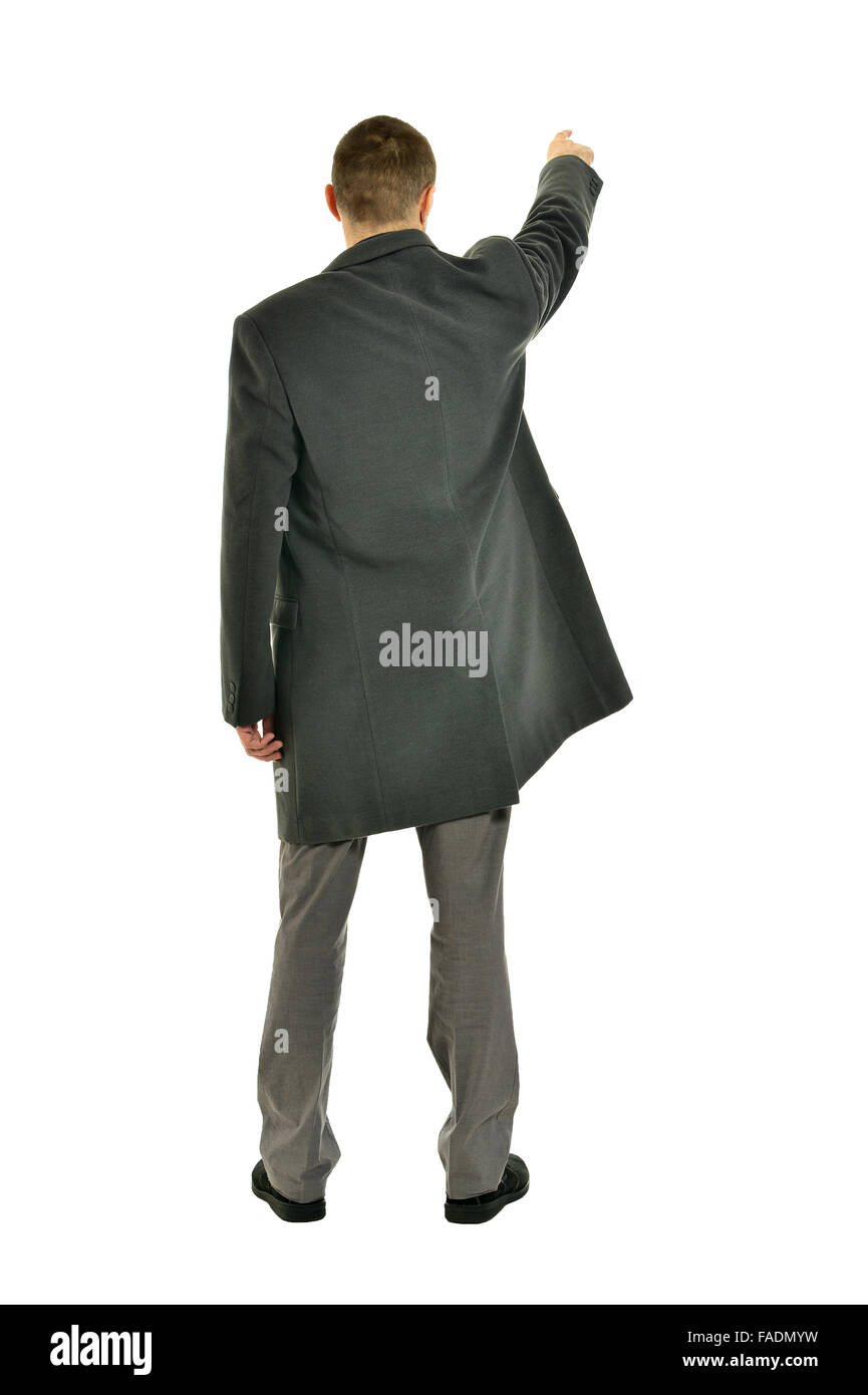 Handsome Man in coat pointing Stock Photo - Alamy
