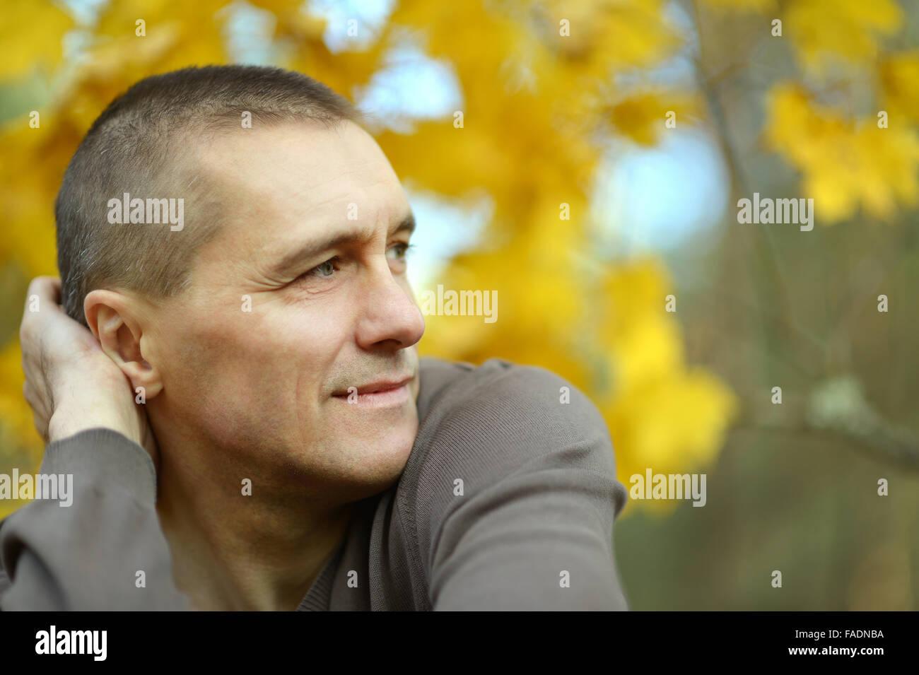 Sad man out for a walk Stock Photo - Alamy
