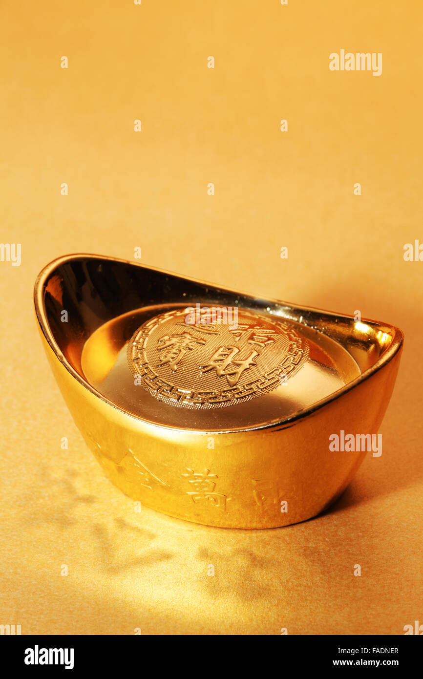Close-up of a gold ingot Stock Photo - Alamy