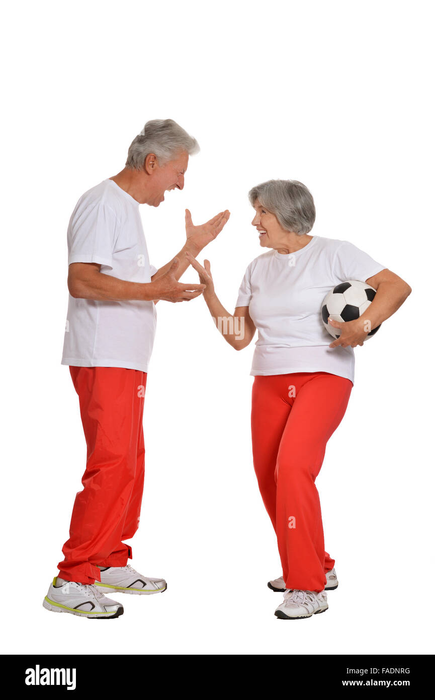 Senior couple with a ball Stock Photo - Alamy