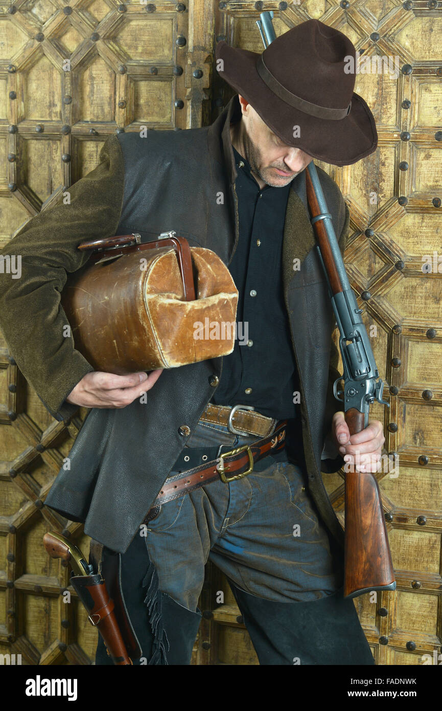 Bandit with gun Stock Photo - Alamy