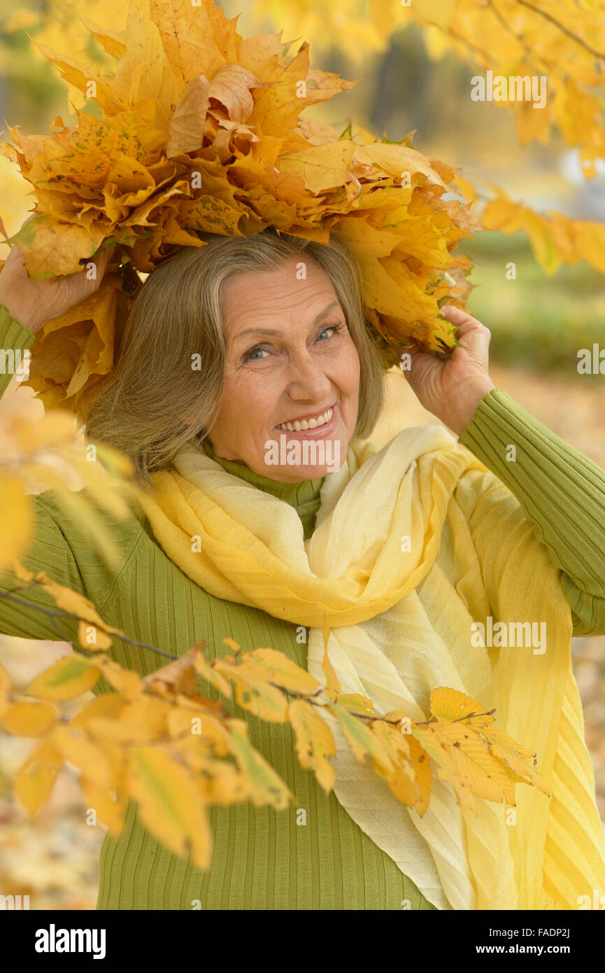 Senior woman in park Stock Photo - Alamy