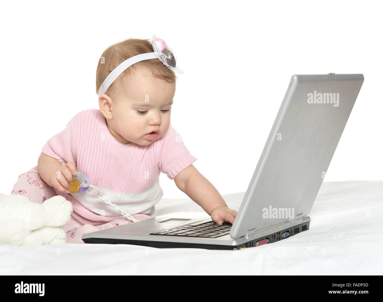 baby playing with laptop Stock Photo - Alamy