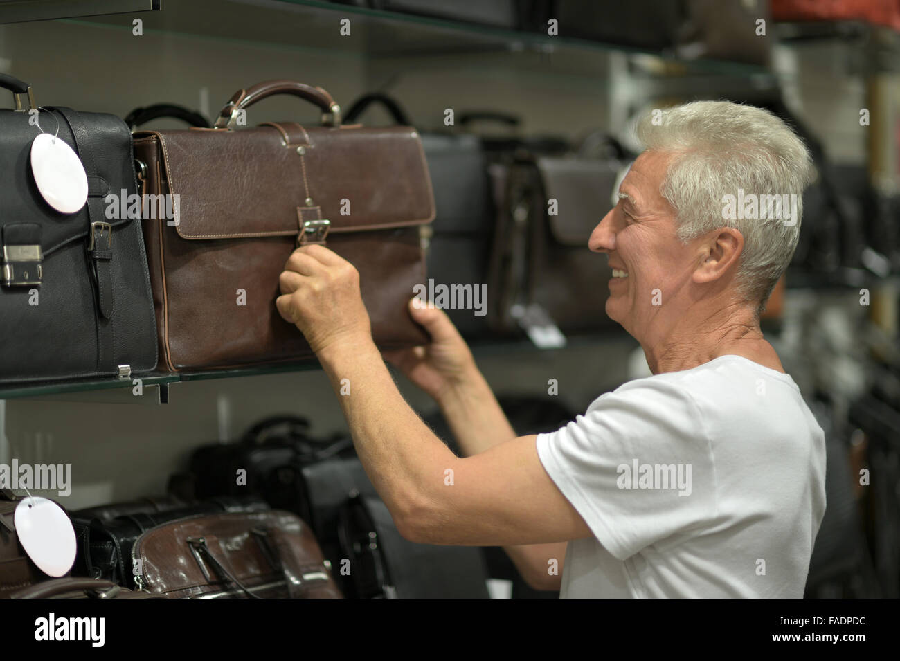 Mature man in mall Stock Photo - Alamy