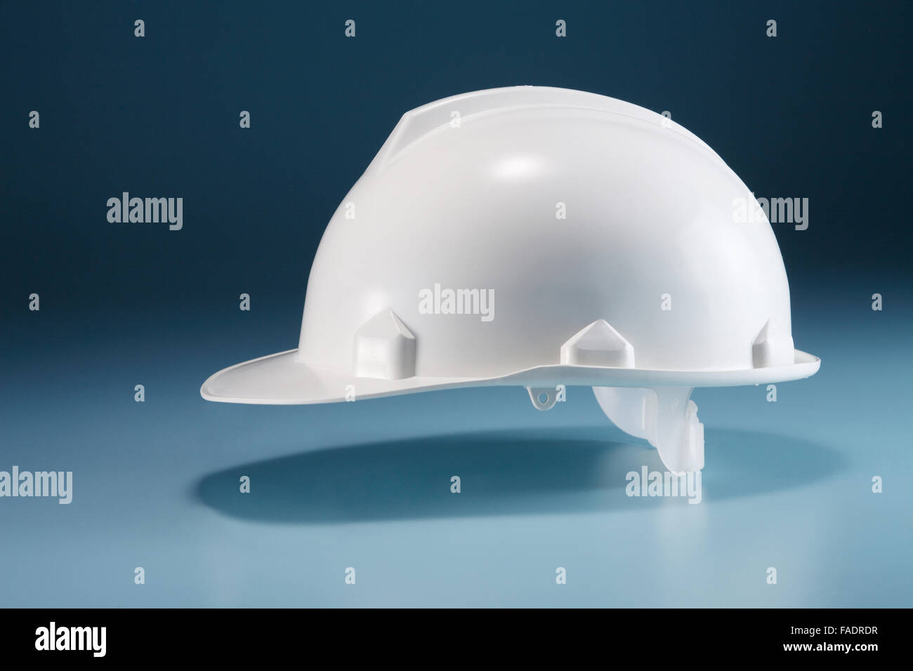 White construction workers safety helmet Stock Photo - Alamy