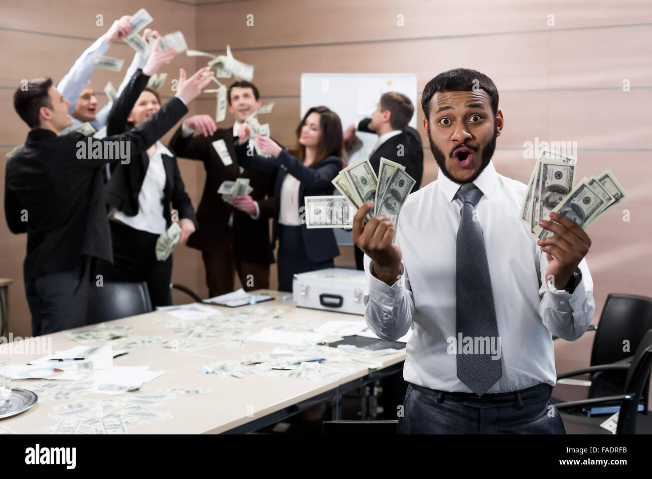 Boss divides profit. Company celebrates success. Successful people ...