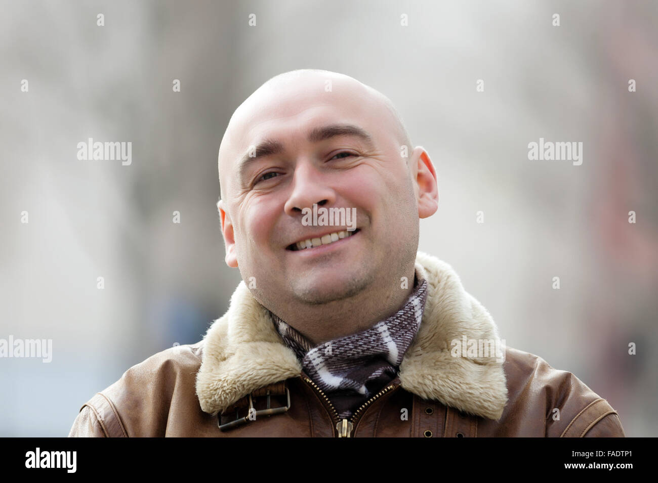smiling guy at city street in autumn Stock Photo - Alamy