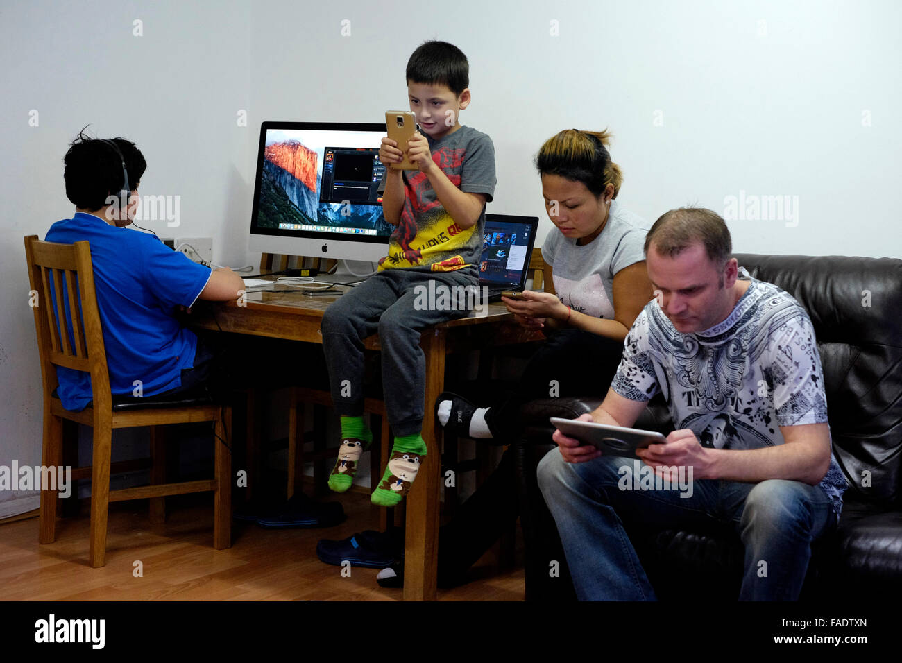 Electronic devices family hi-res stock photography and images - Alamy