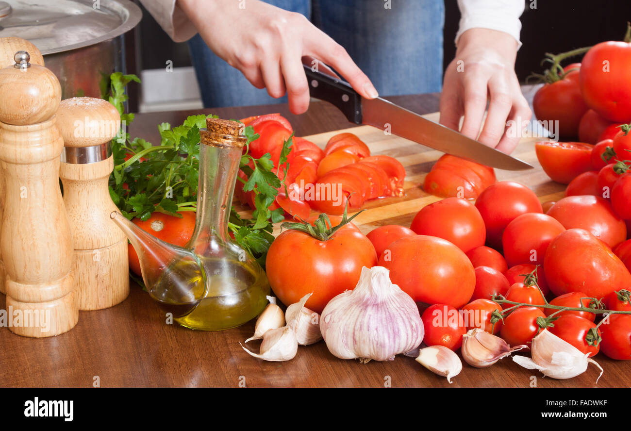 Slicing tomato close up girl hi-res stock photography and images - Alamy