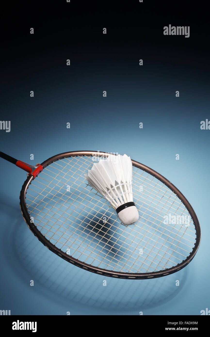 Shuttlecock on badminton racket Stock Photo - Alamy