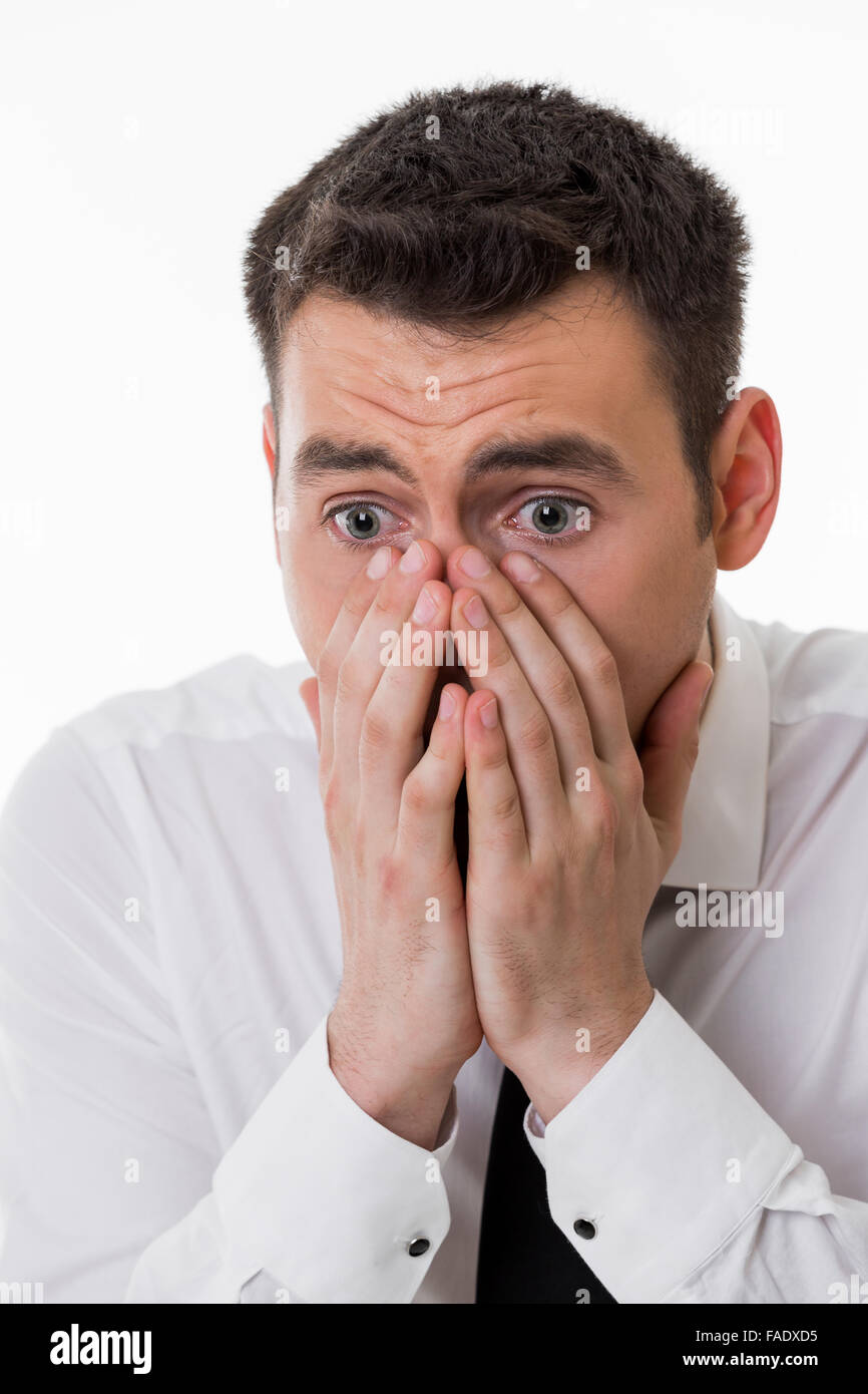 Young guy surprised. Clerk impressed. Emotional guy Stock Photo - Alamy