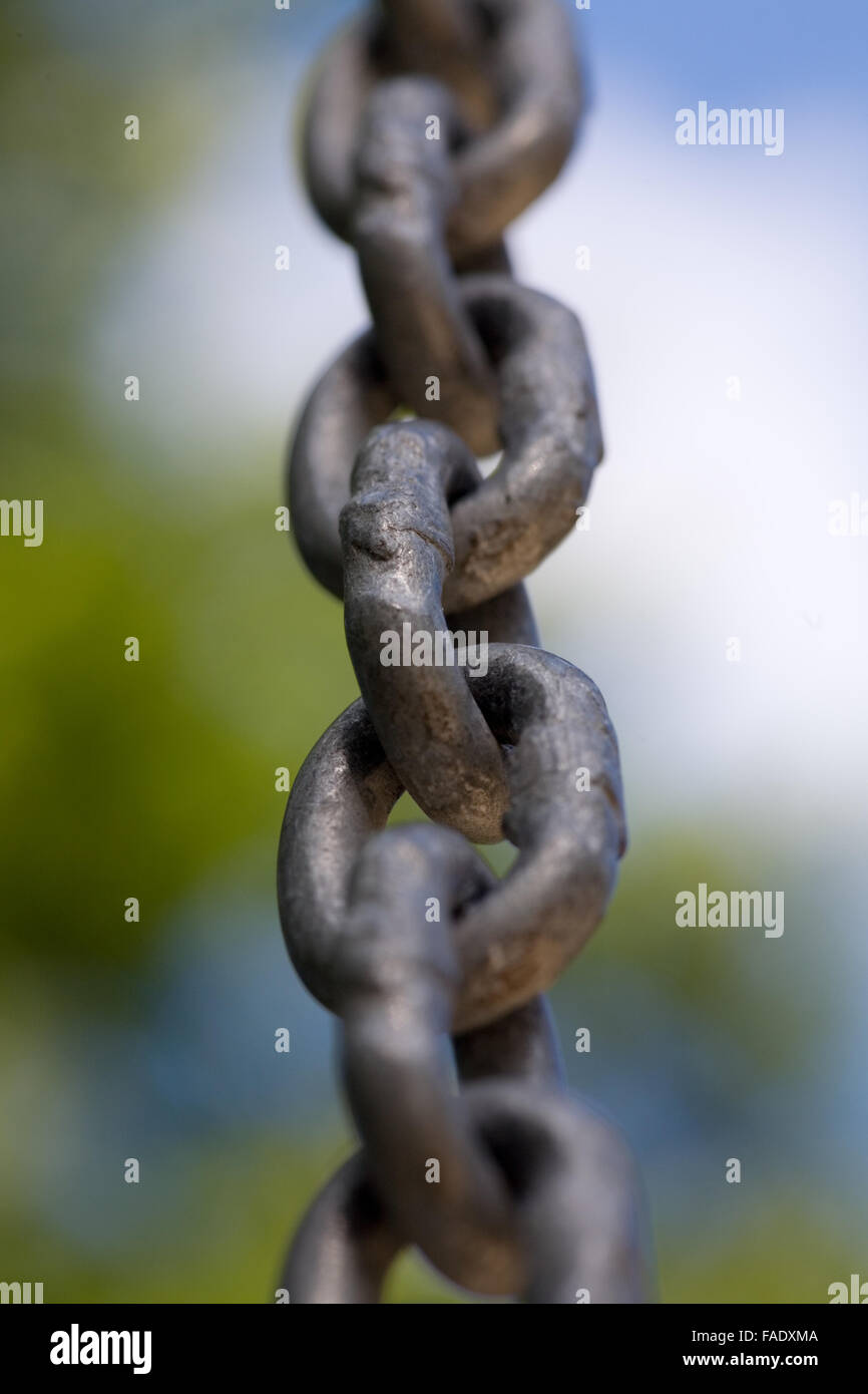 steel chain. At no isolated background Stock Photo - Alamy