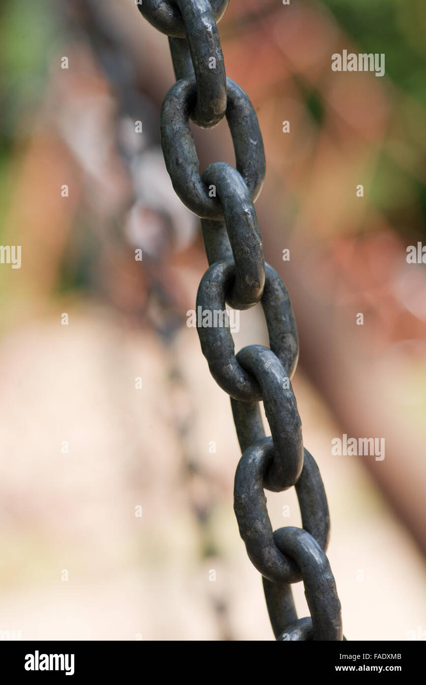 steel chain. At no isolated background Stock Photo - Alamy
