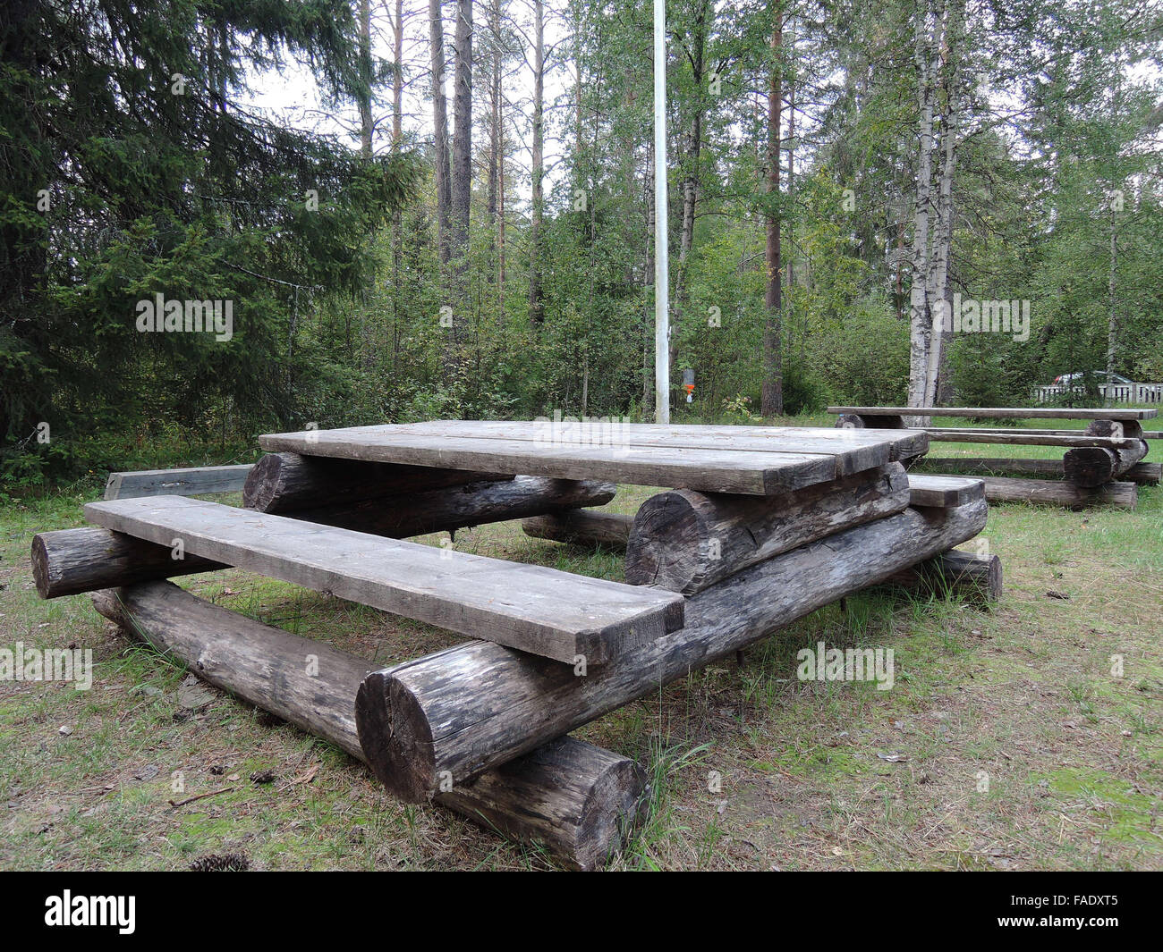 big bench from wood in Finland country Stock Photo - Alamy