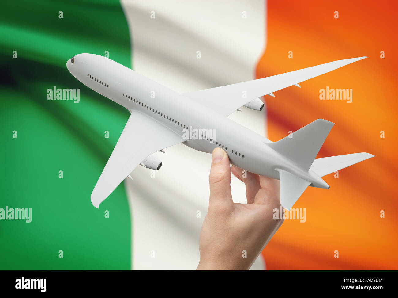 Airplane in hand with national flag on background - Ireland Stock Photo ...