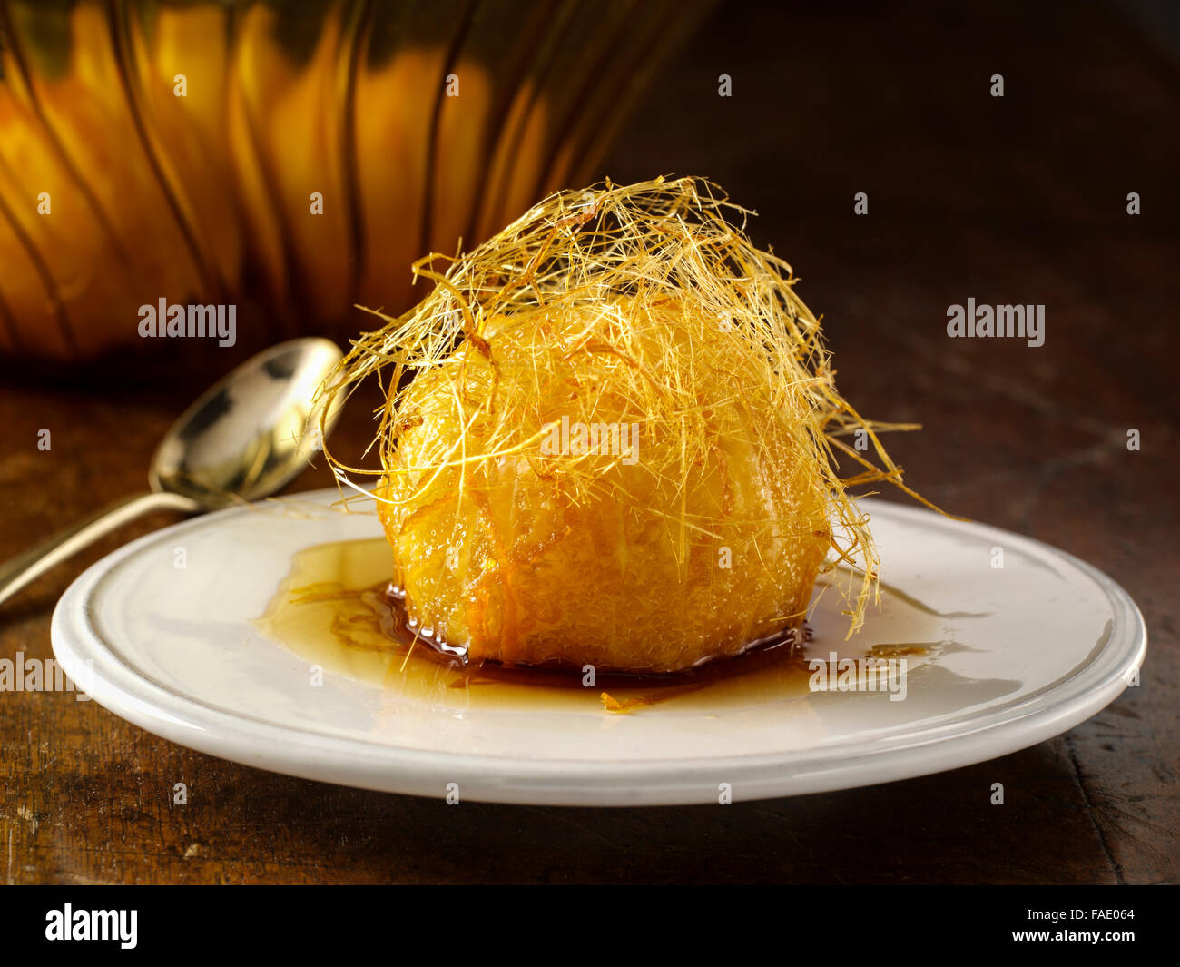 Caramel orange caramelized spun sugar hi-res stock photography and ...