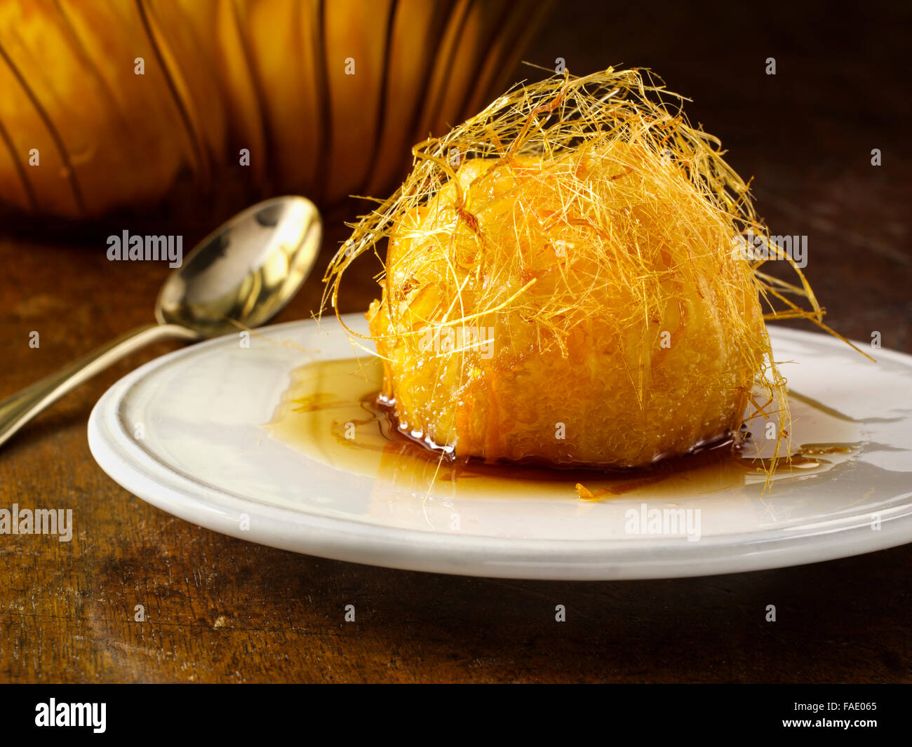 Caramel orange caramelized spun sugar hi-res stock photography and ...