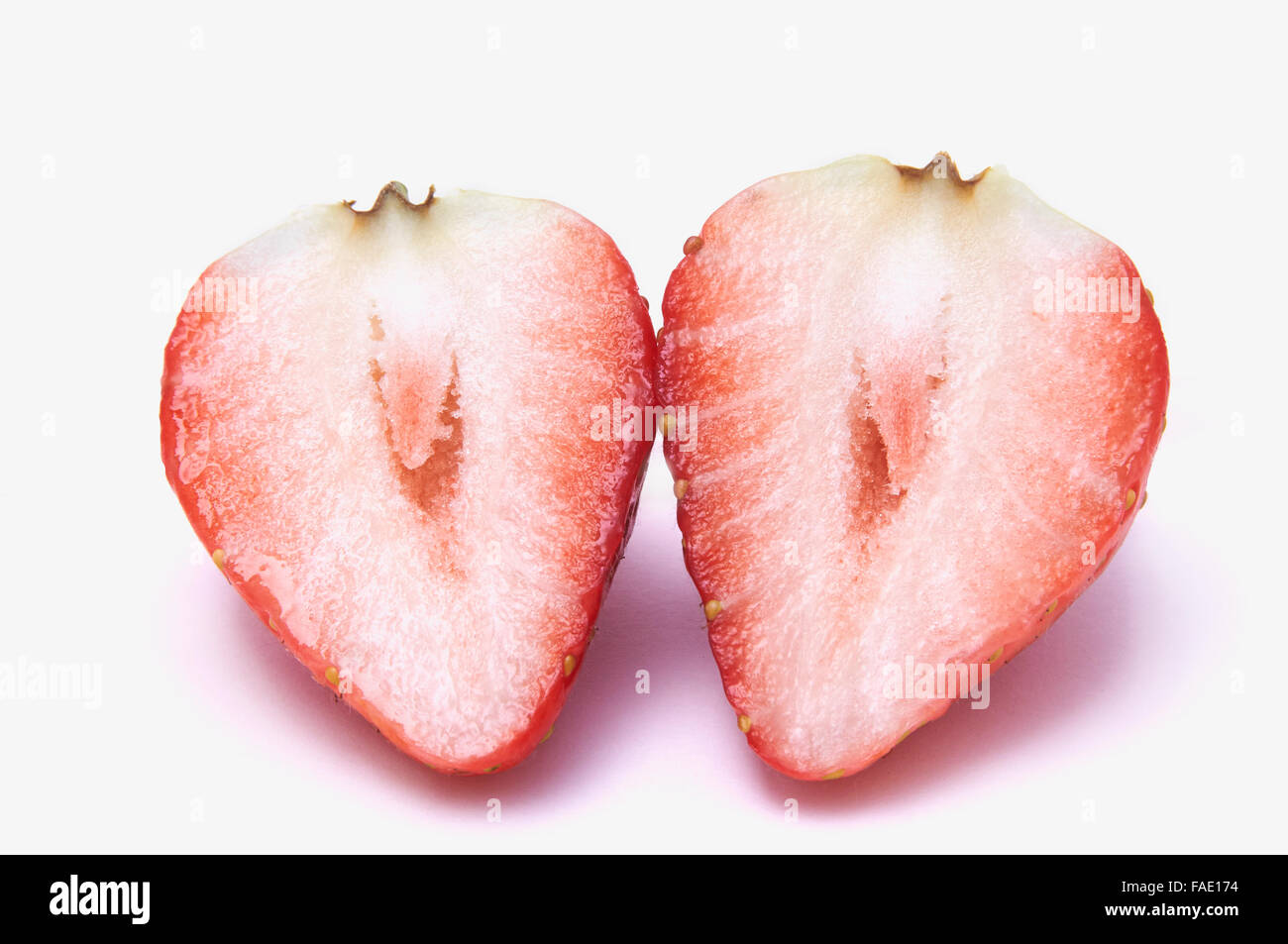 Sliced strawberry without stalk Stock Photo - Alamy