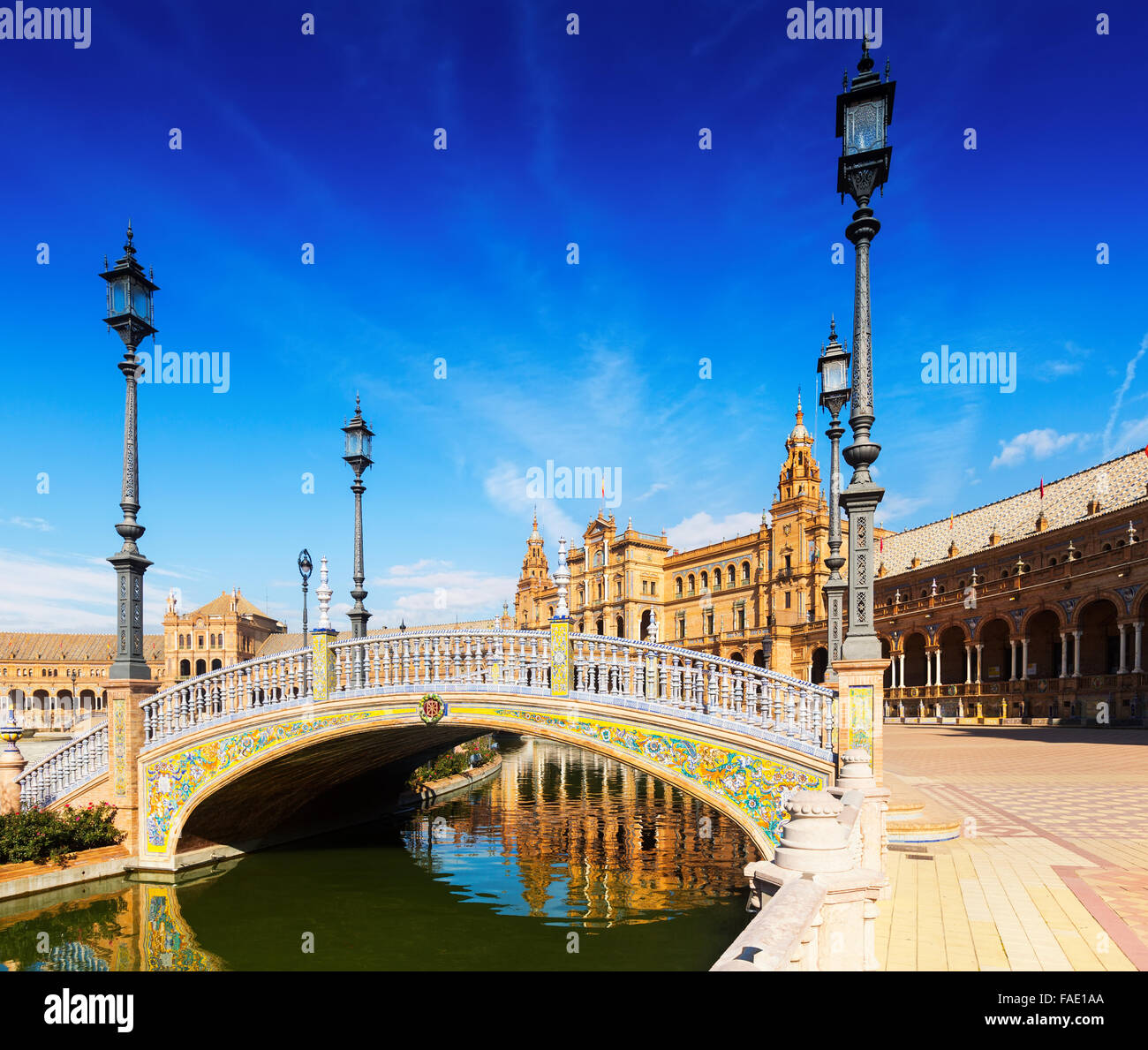 sunny view of Plaza de Espana with bridges. Seville, Spain Stock Photo ...