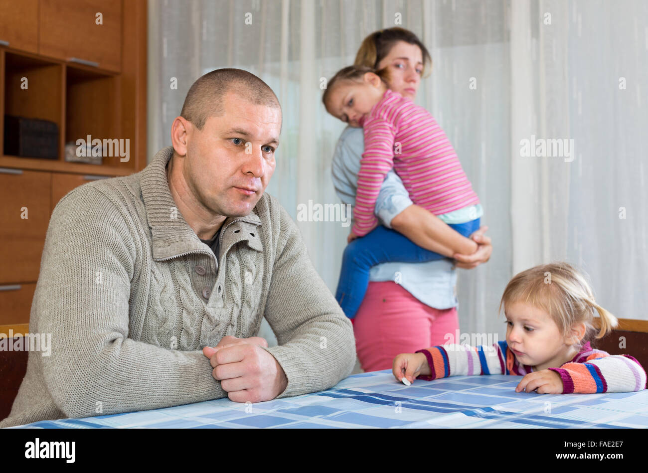 Family with little children having conflict at home Stock Photo - Alamy