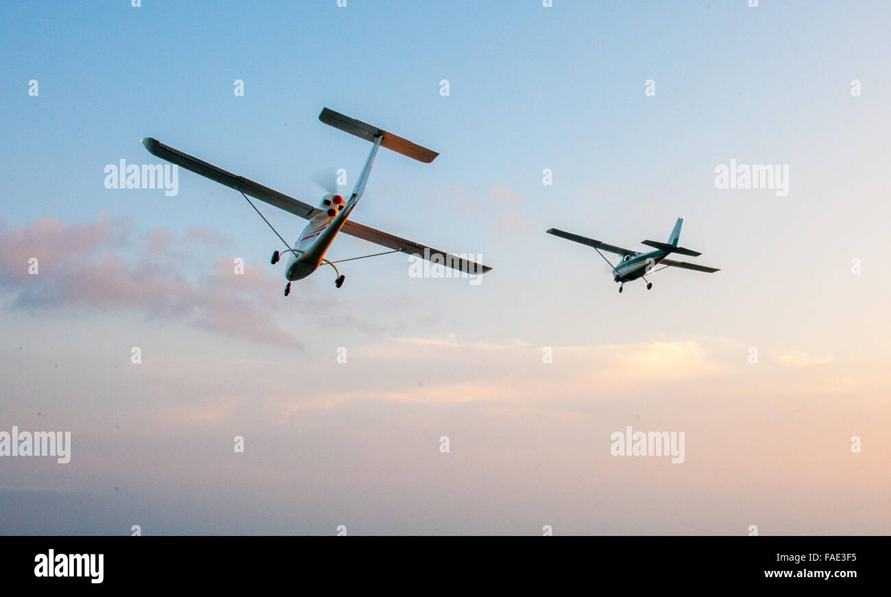 Aerial view of two planes at sunset during a formation flight Stock ...