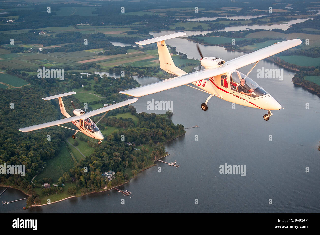 Aerial view of two planes at sunset during a formation flight Stock ...