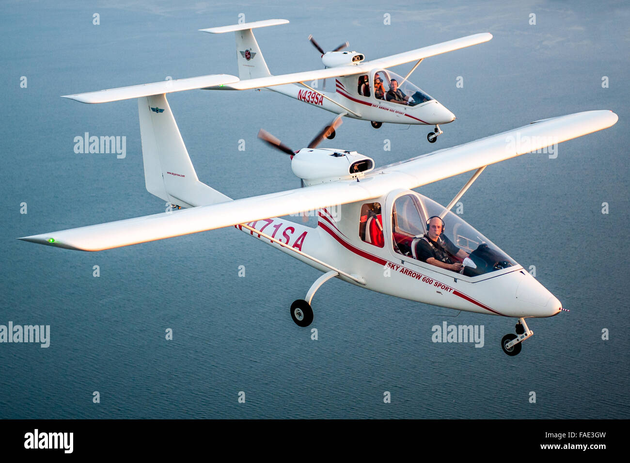 Aerial view of two planes at sunset during a formation flight Stock ...