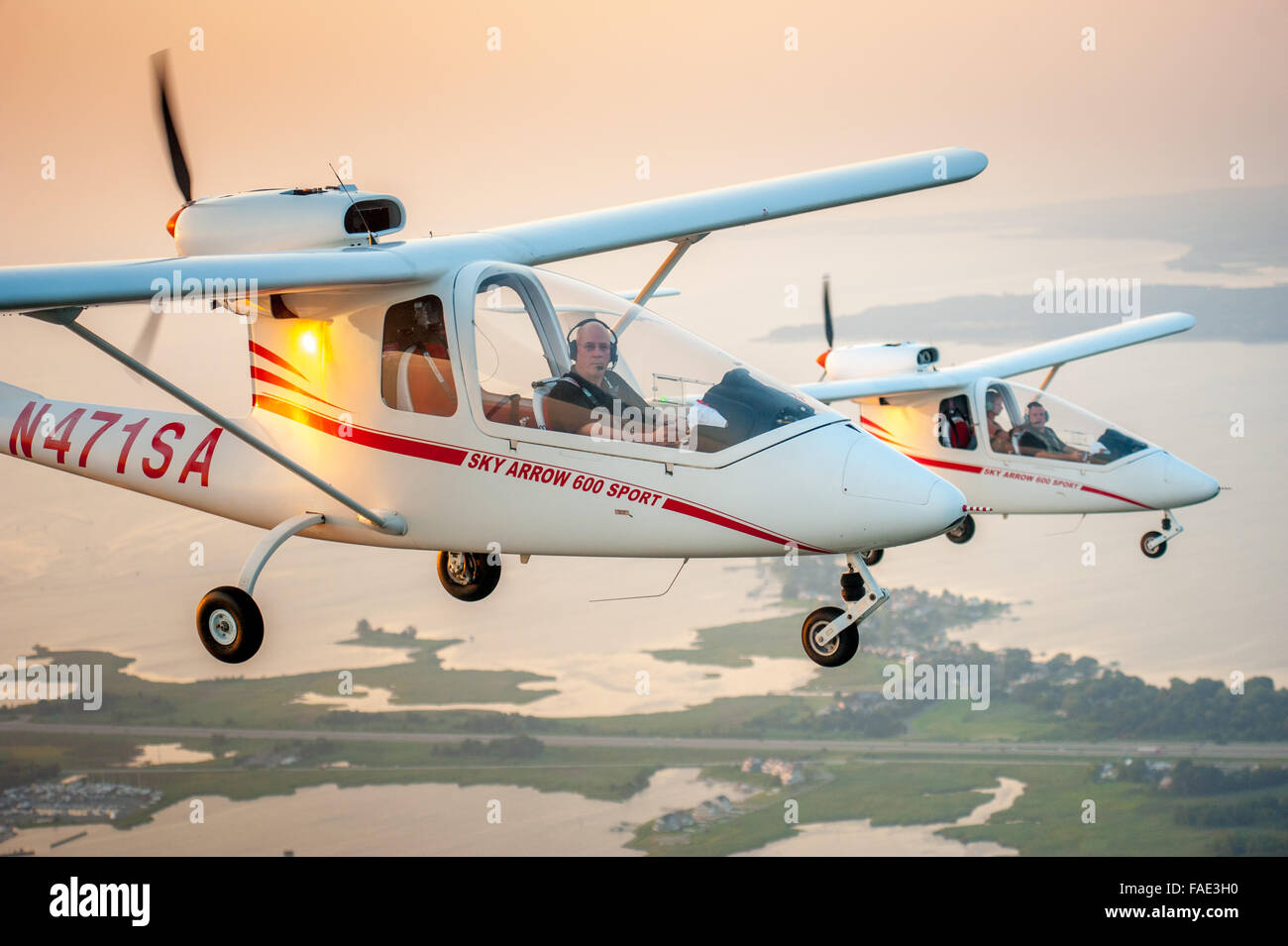 Aerial view of two planes at sunset during a formation flight Stock ...